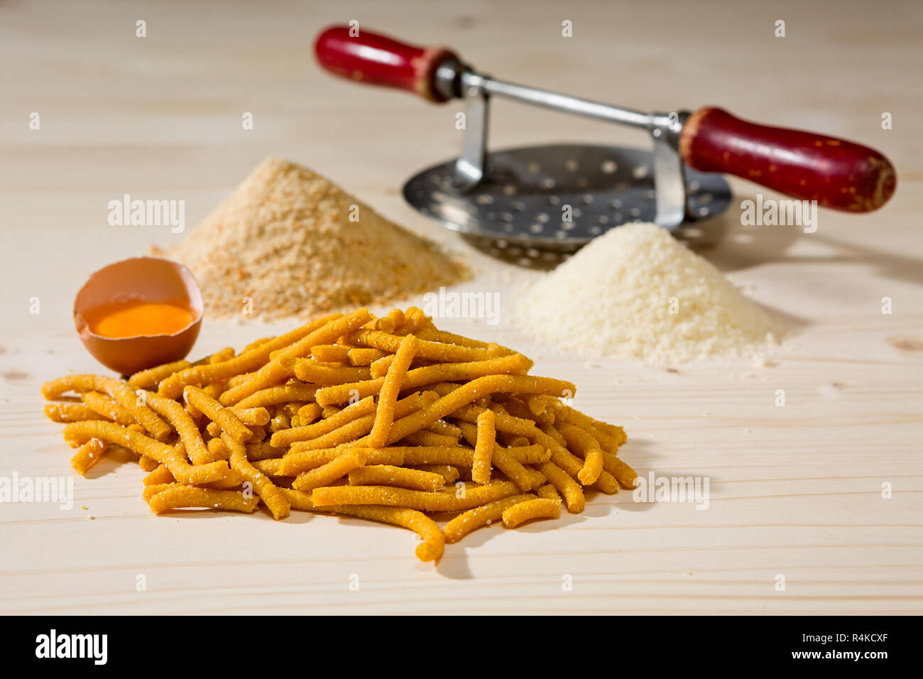 Passatelli original Italian pasta and ingredients Stock Photo - Alamy