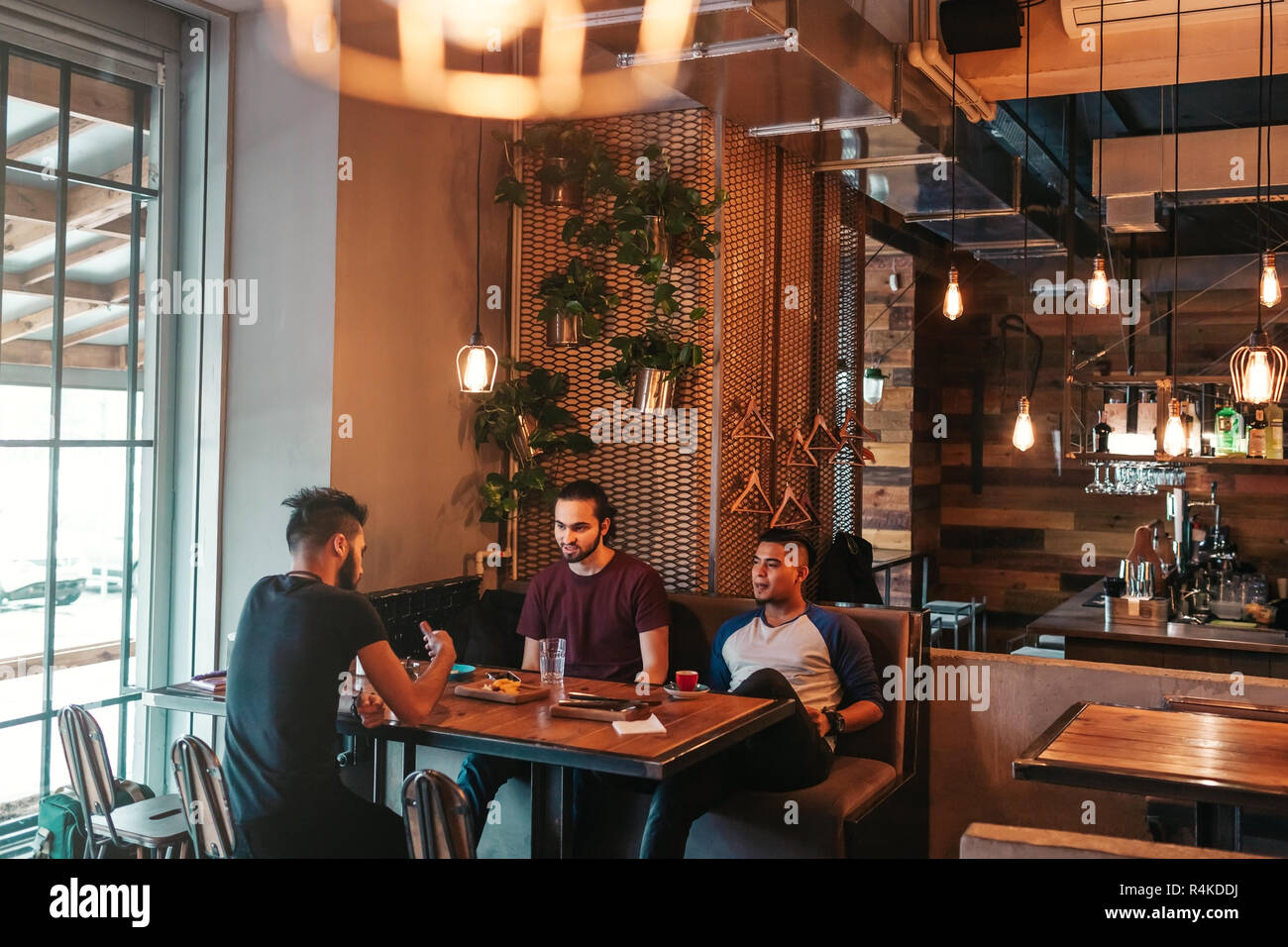 Group men friends chilling hi-res stock photography and images - Alamy