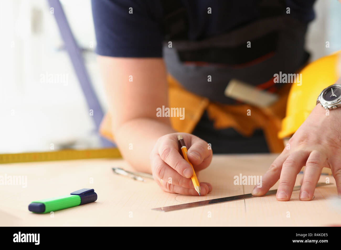 Arms of worker making structure plan on scaled paper closeup Stock ...