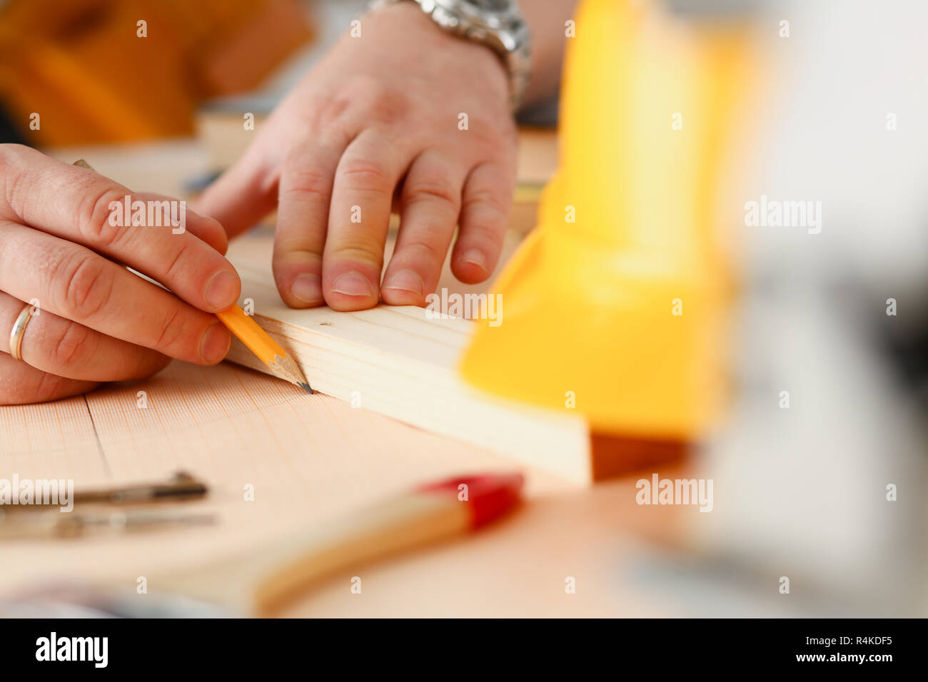 Arms of worker making structure plan on scaled paper closeup Stock ...