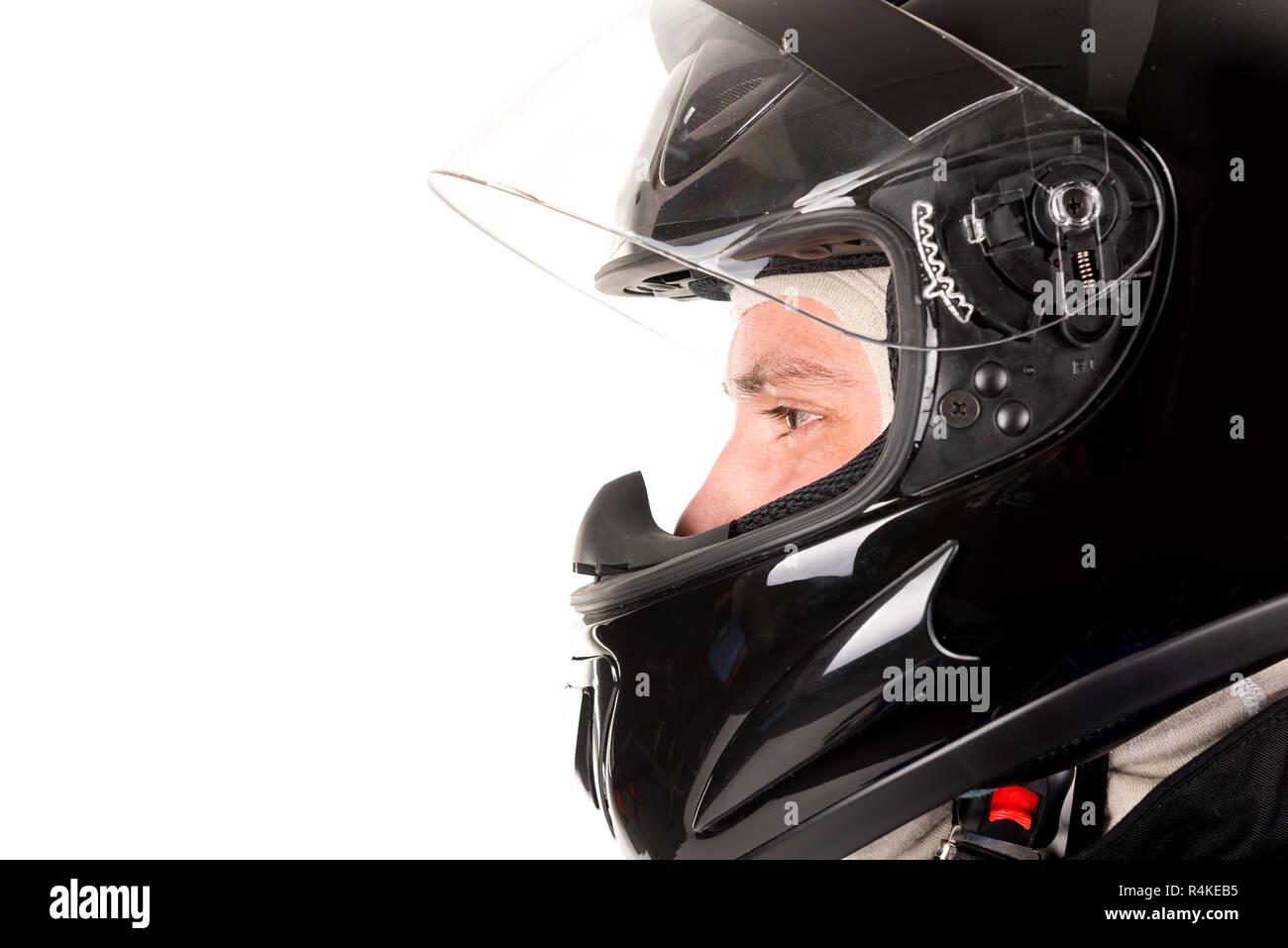 Racing driver with helmet Stock Photo - Alamy