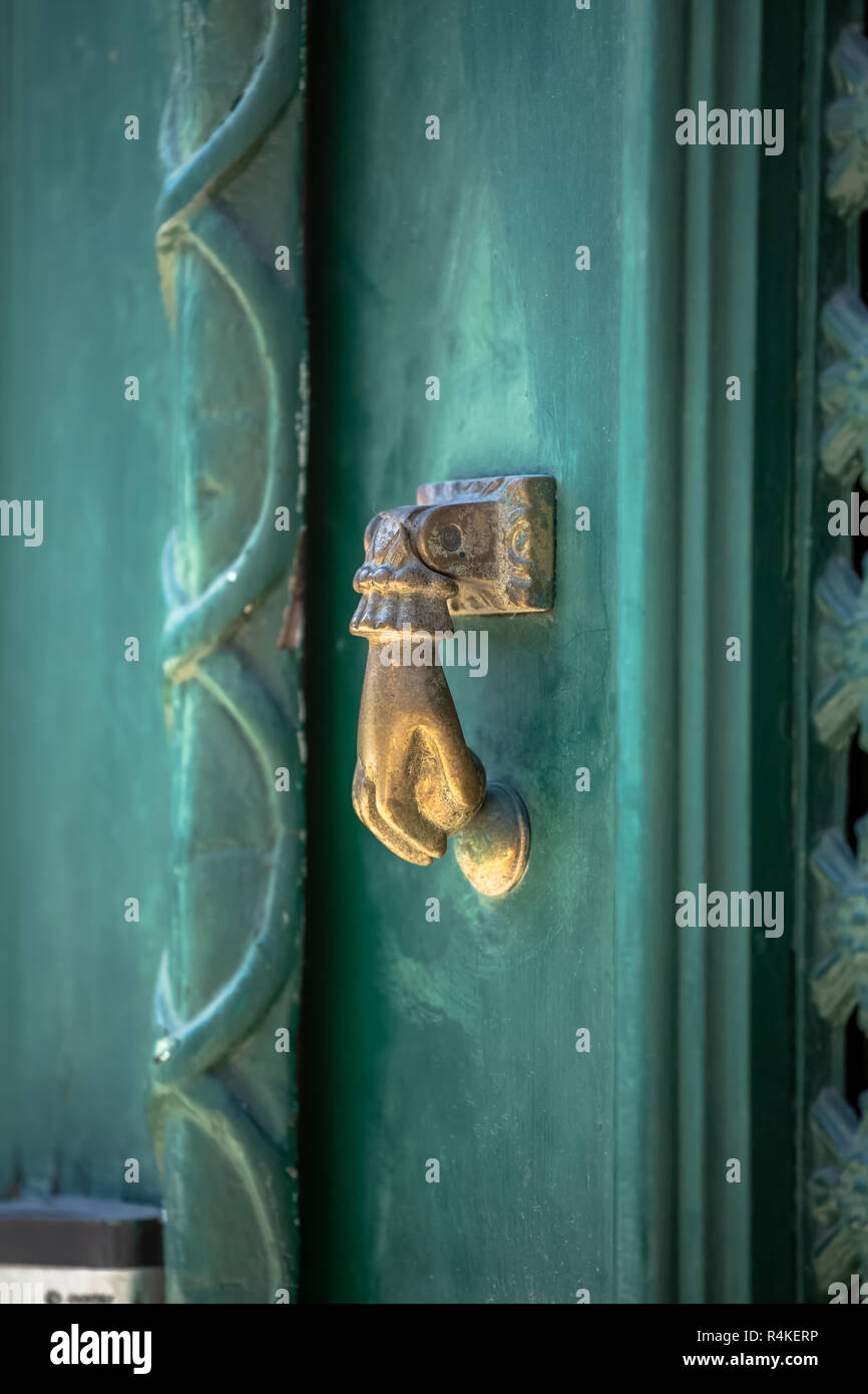 Detail of golden hand door handle, retro style, Portugal Stock Photo ...