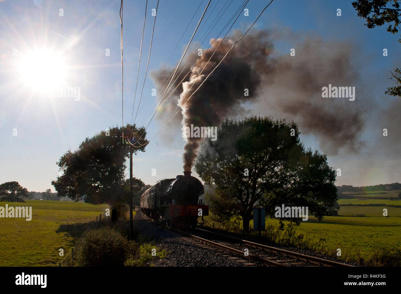 Austerity saddle tank 0-6-0 steam locomotive hauls a train up the steam ...