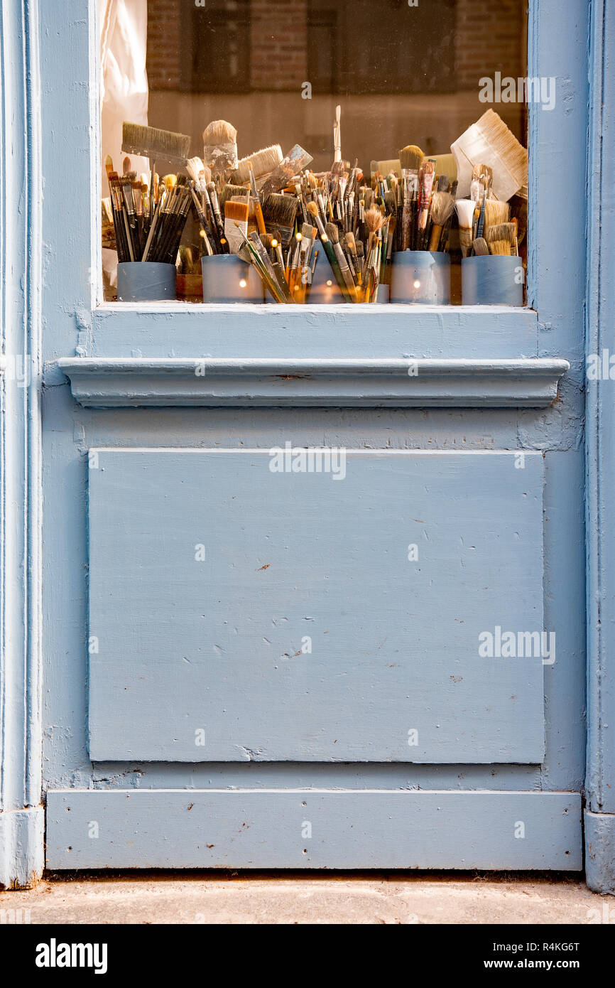 Artists brushes behind the window Stock Photo - Alamy