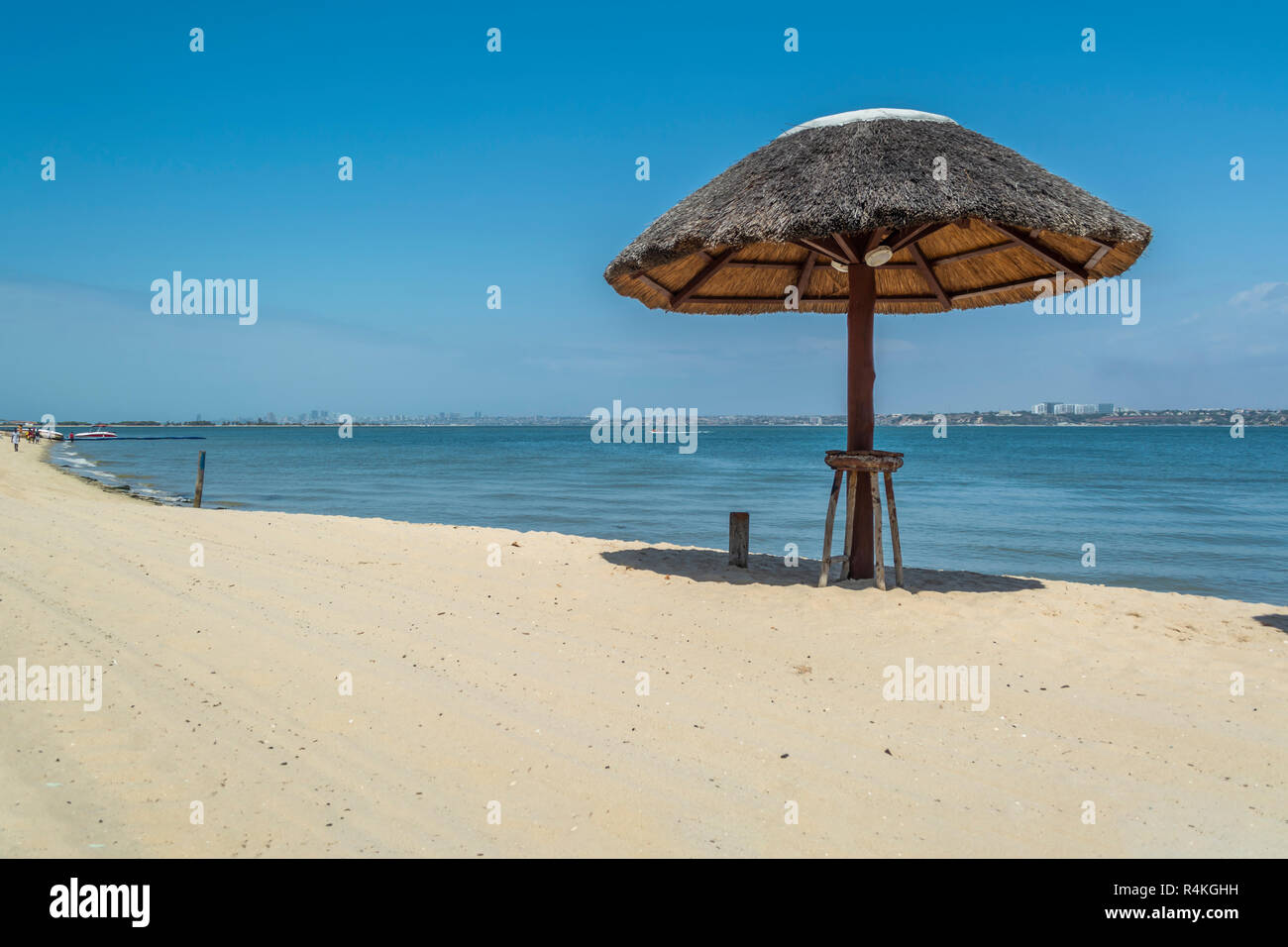 Straw parasol on tropical and paradisiac beach, in Angola Stock Photo ...