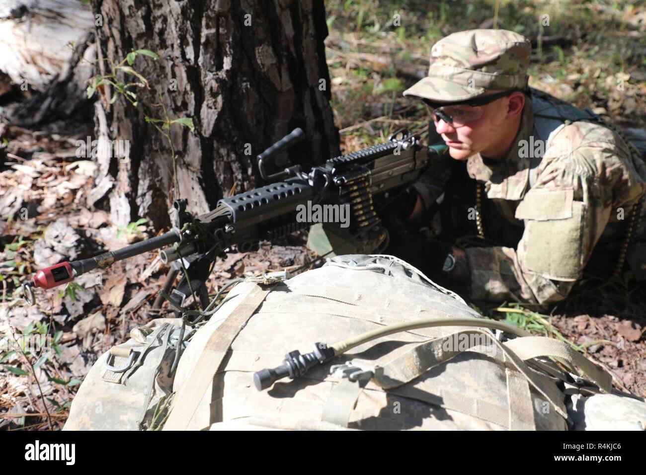 A U.S. Army Pre-Ranger Student, pulls security with his M249 Squad ...