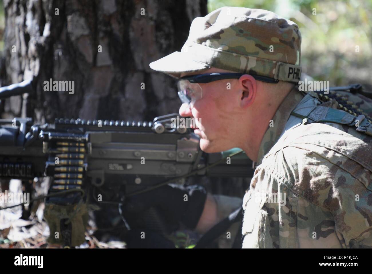 A U.S. Army Pre-Ranger Student, pulls security with his M249 Squad ...