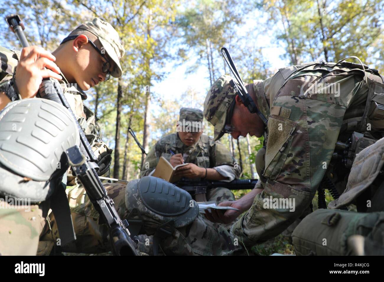 A group of U.S. Army Pre-Ranger Students, looks over the route to the ...