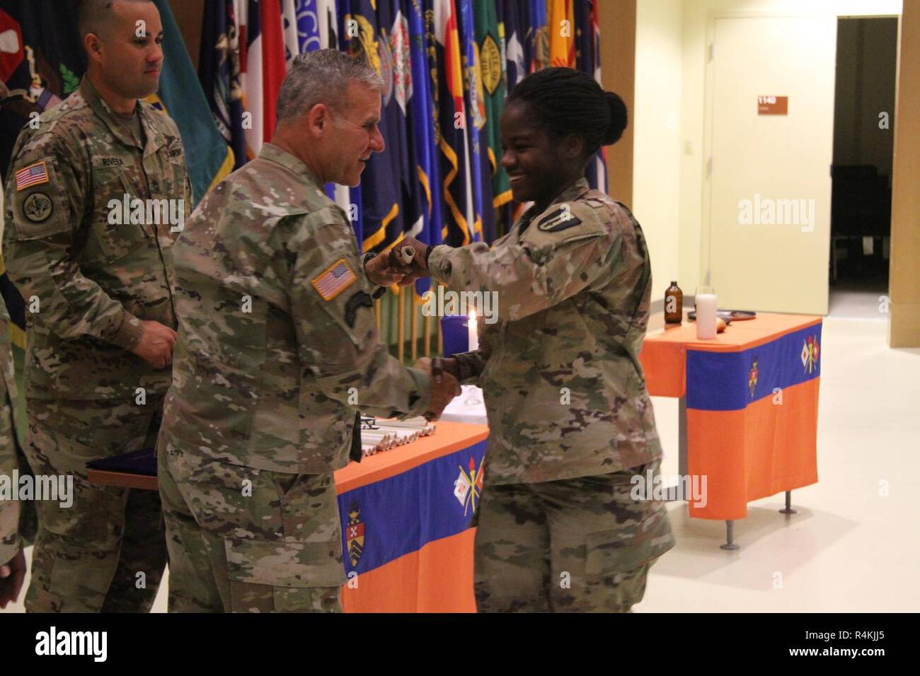 CSM Rick Merritt, 8th Army Command Sergeant Major, presents a ...