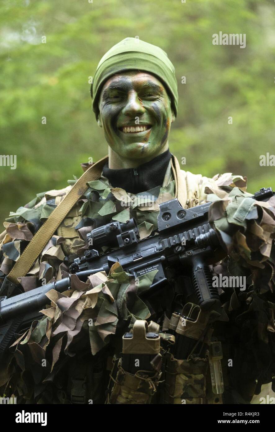 Cergeant Raph, with the French Mountain Commando Unit, secures a ...