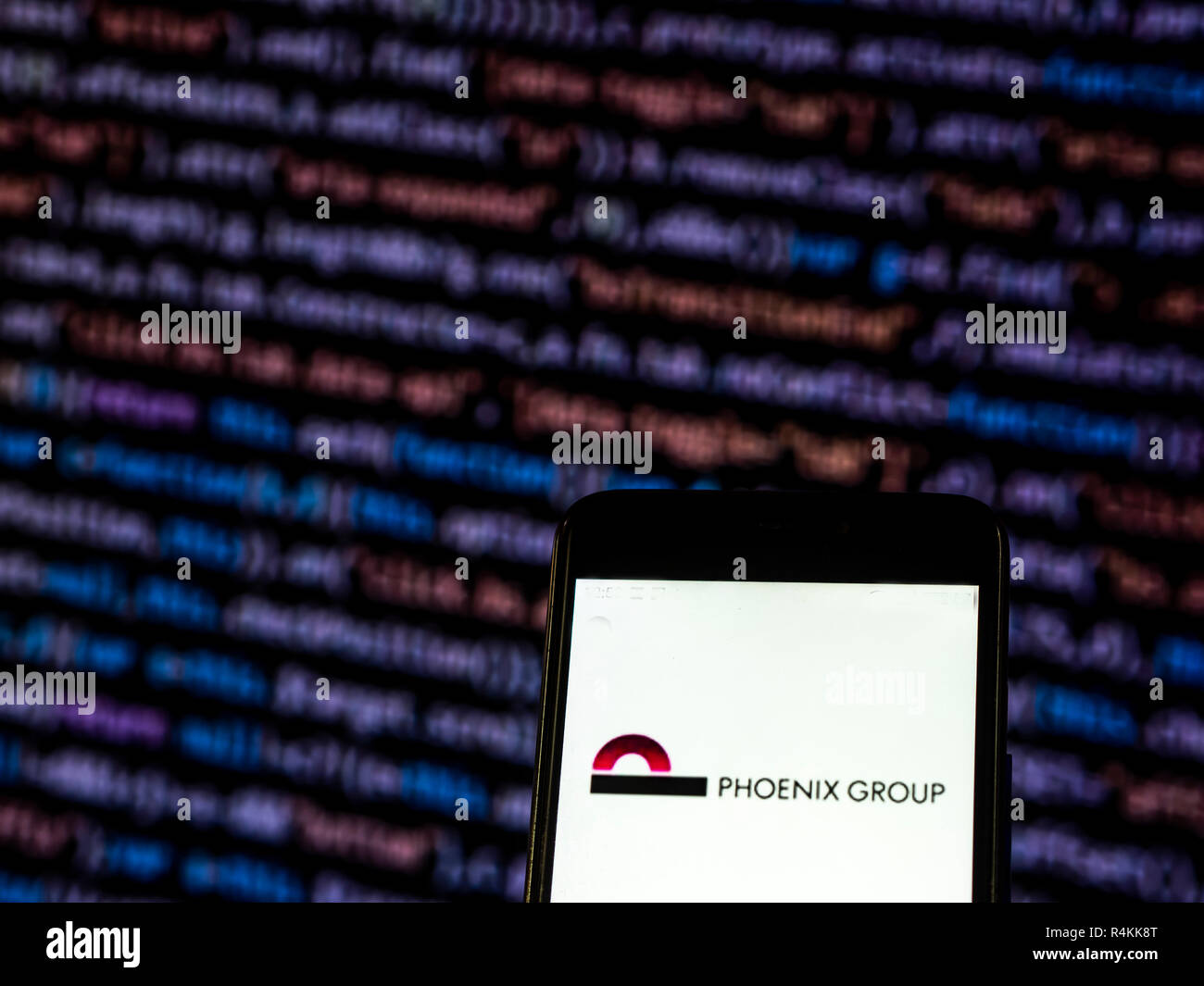 Phoenix Group Insurance company logo seen displayed on smart phone ...
