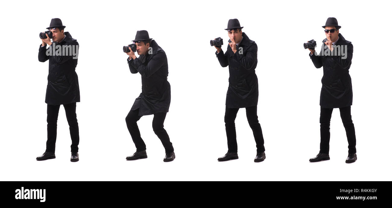 Spy with camera taking pictures isolated on white Stock Photo - Alamy