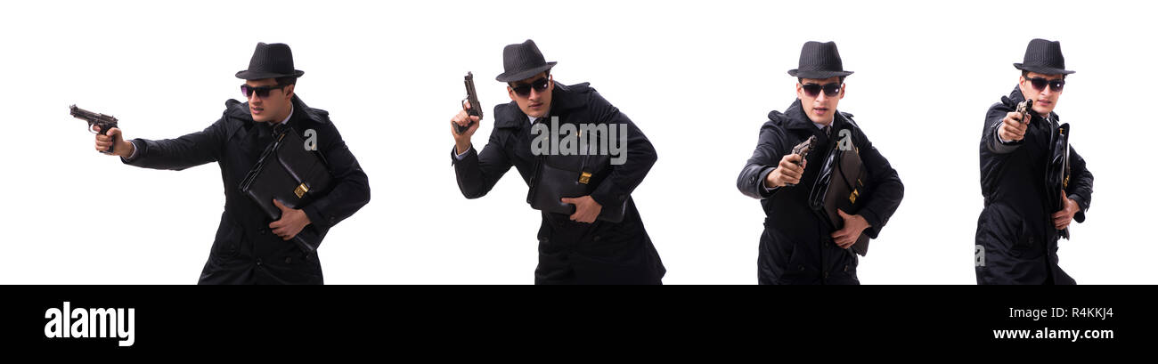 Man spy with handgun isolated on white background Stock Photo - Alamy