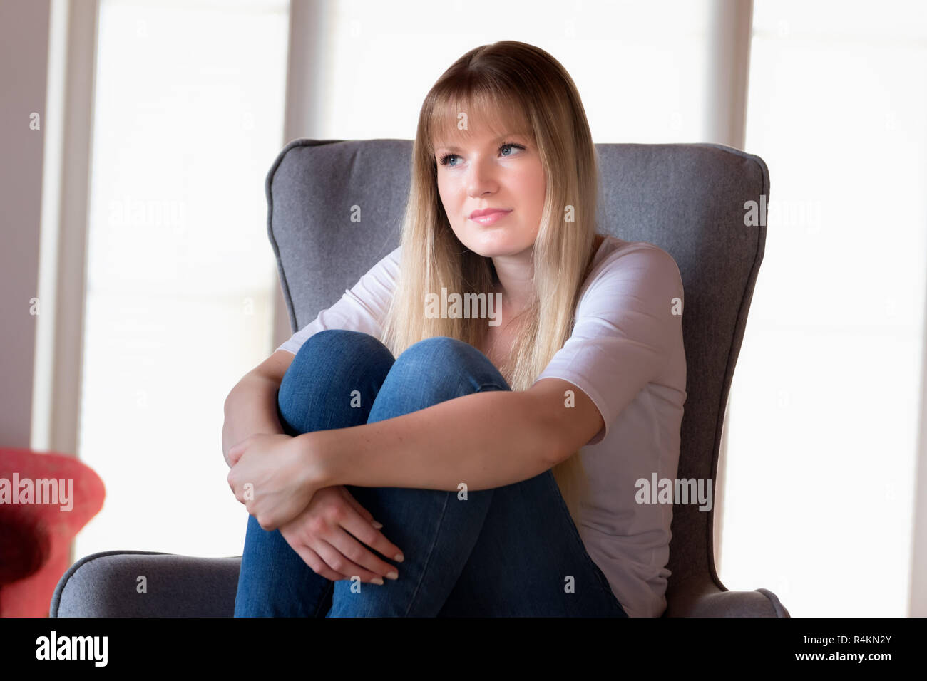 Girl crying on chair hi-res stock photography and images - Alamy