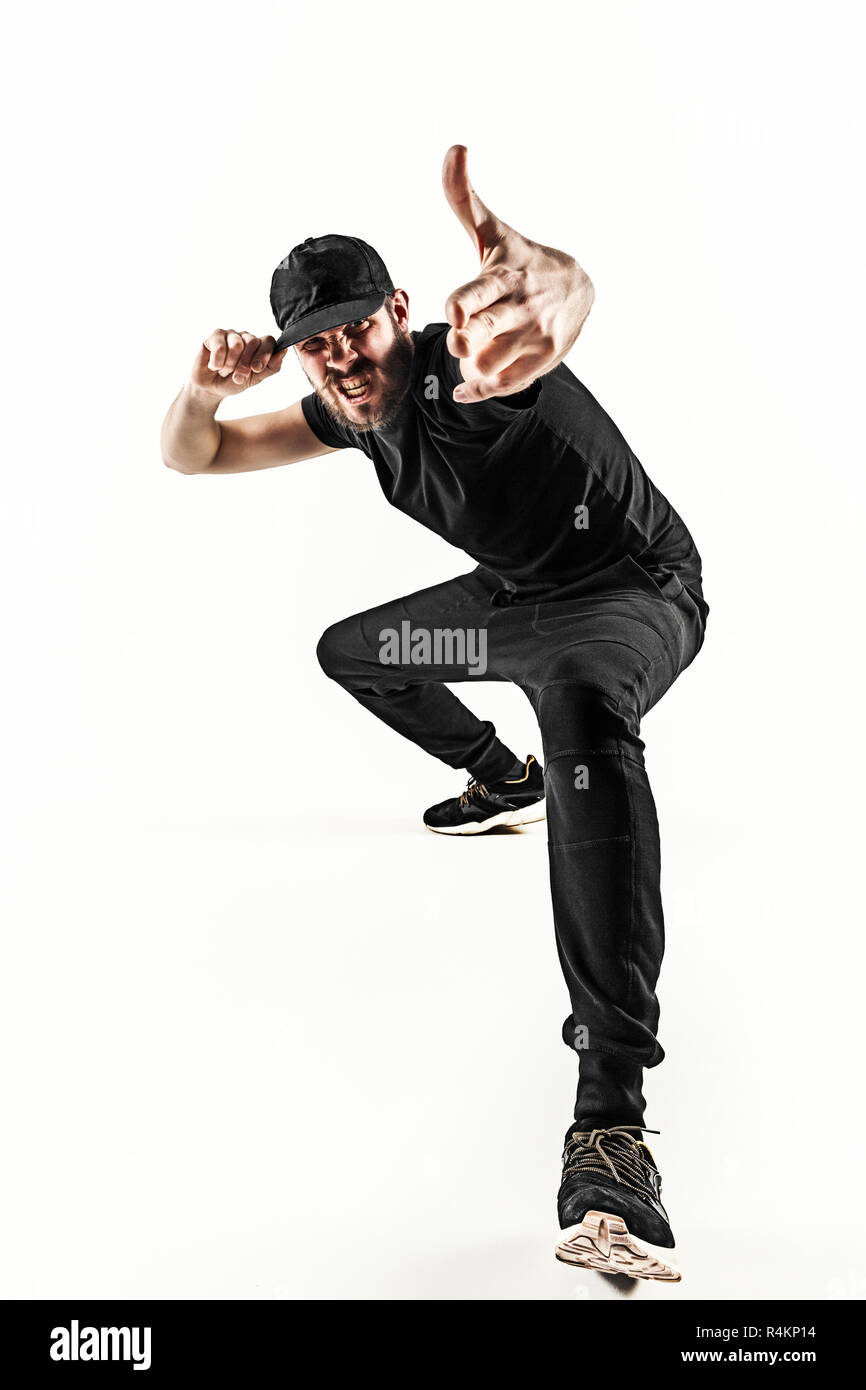 The silhouette of one hip hop male break dancer dancing on white ...