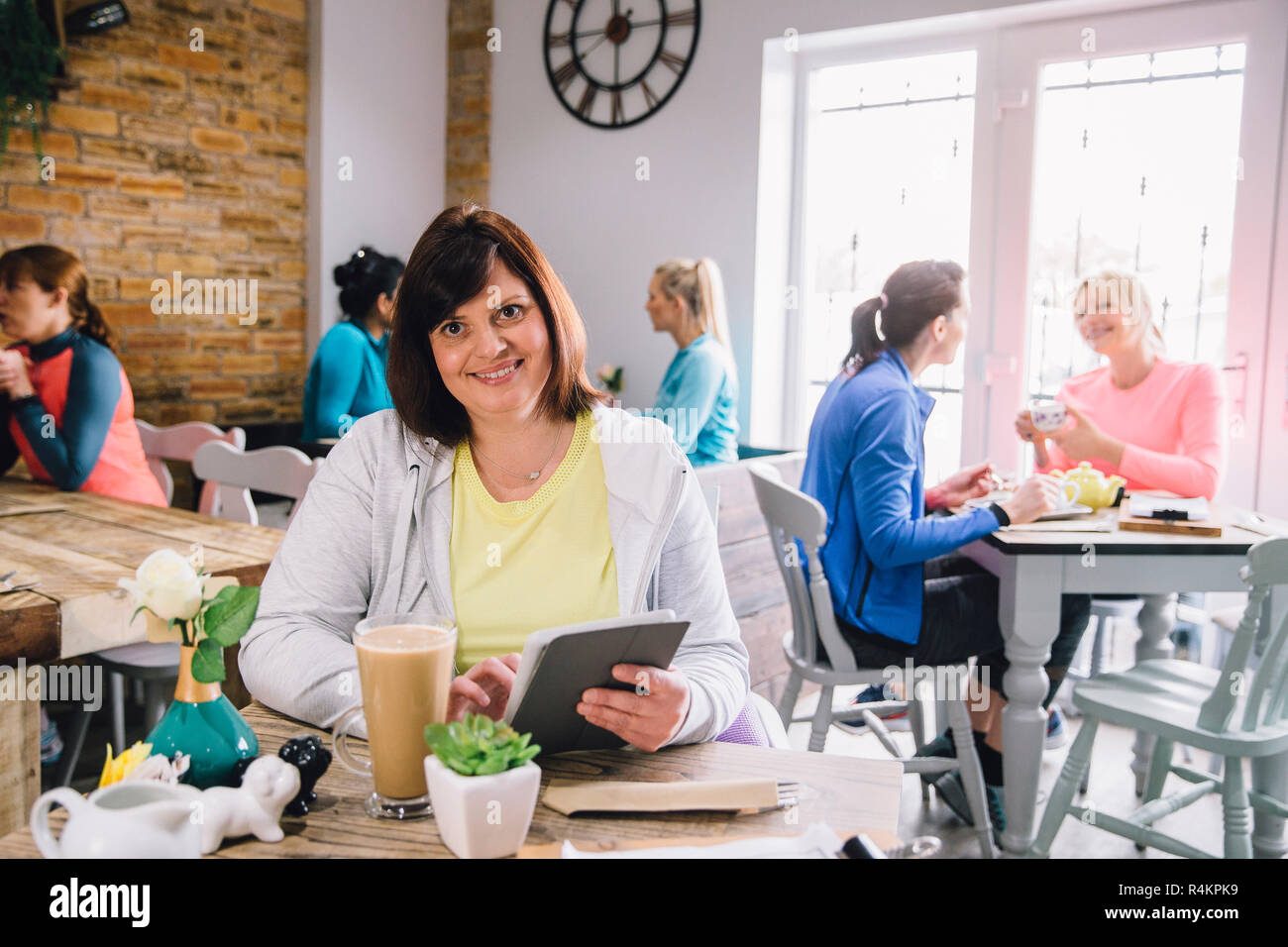 Working In A Cafe Stock Photo - Alamy