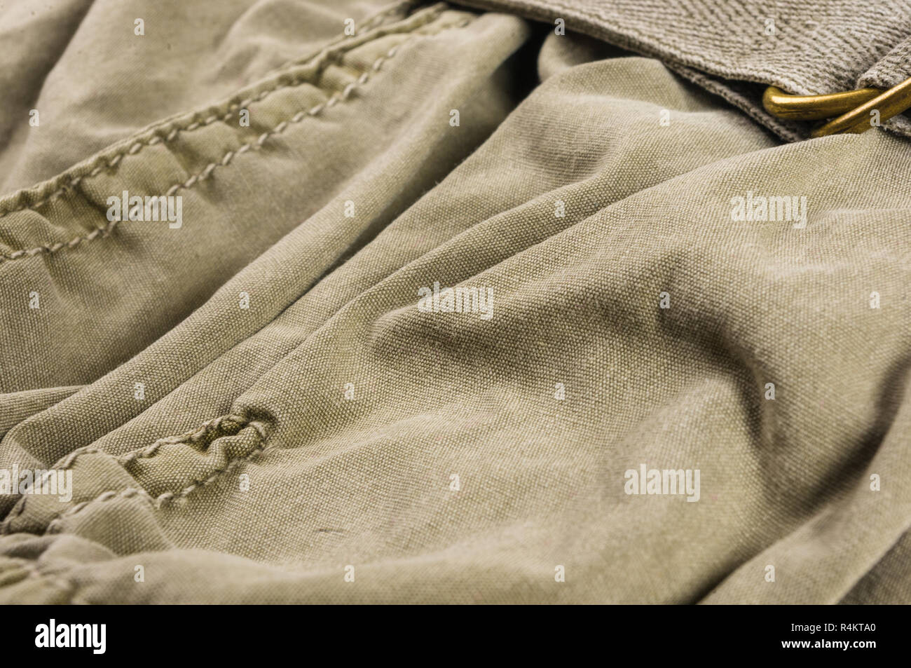 clothing items washed cotton fabric texture with seams, macro, close-up ...