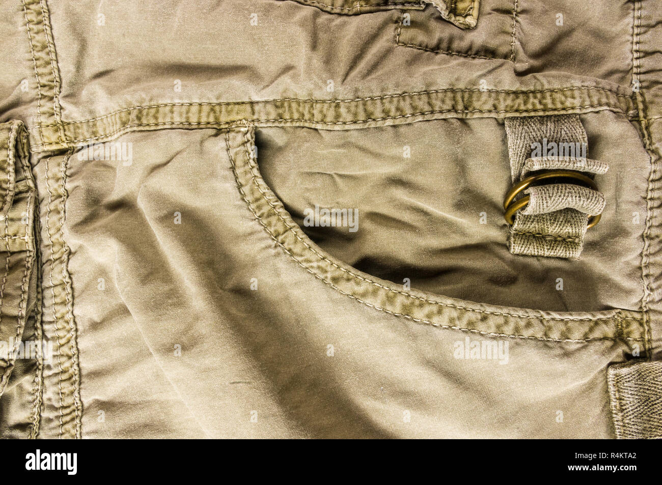 clothing items washed cotton fabric texture with seams, clasps, buttons ...