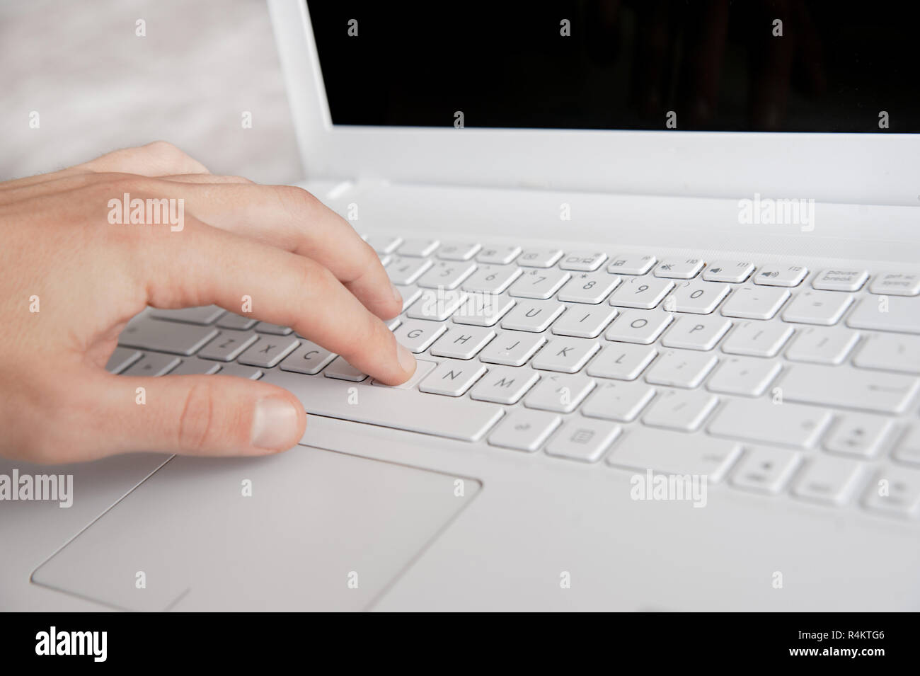 Human finger on touchpad keyboard hi-res stock photography and images ...