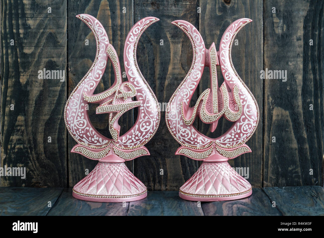 Pink Religious Statuettes with the Names of Allah and Muhammed Stock ...