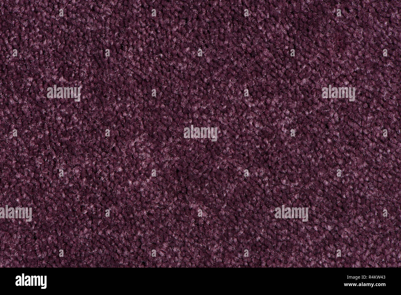 Closeup detail of purple carpet texture background Stock Photo - Alamy