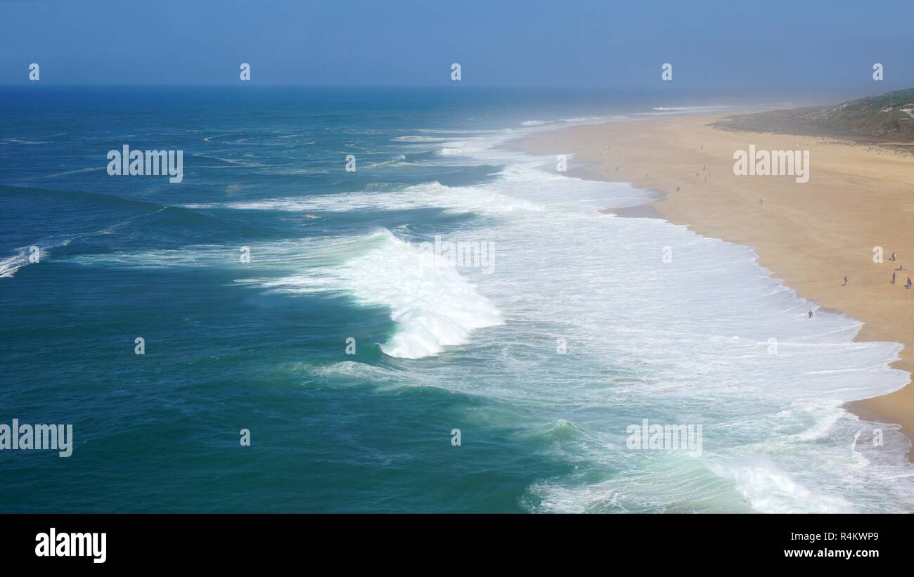 shore line of small tourist village nazare in portugal Stock Photo - Alamy