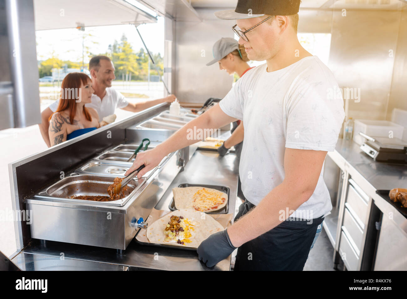 Preparing fast food hi-res stock photography and images - Alamy