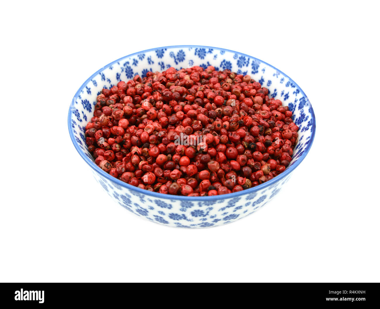 Dried pink peppercorns isolated Cut Out Stock Images & Pictures - Alamy