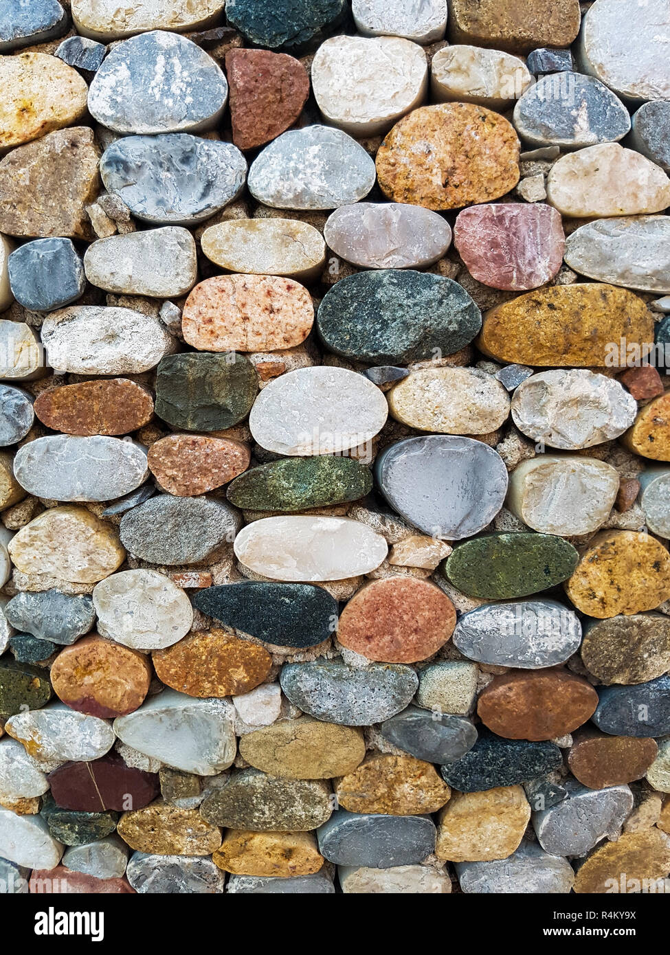 Stone wall rounded stones hi-res stock photography and images - Alamy