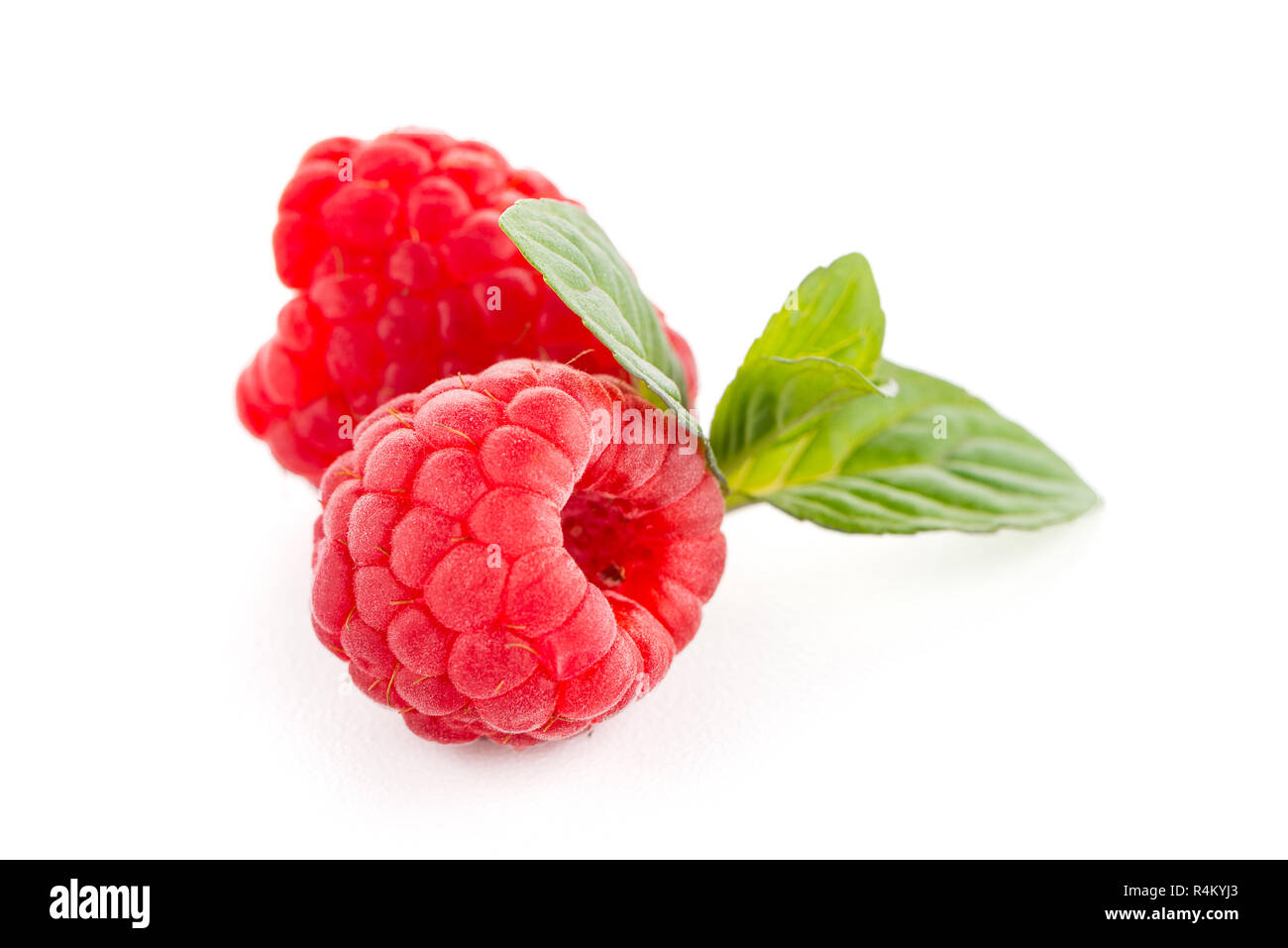 Raspberry fruit isolated over white background Stock Photo - Alamy