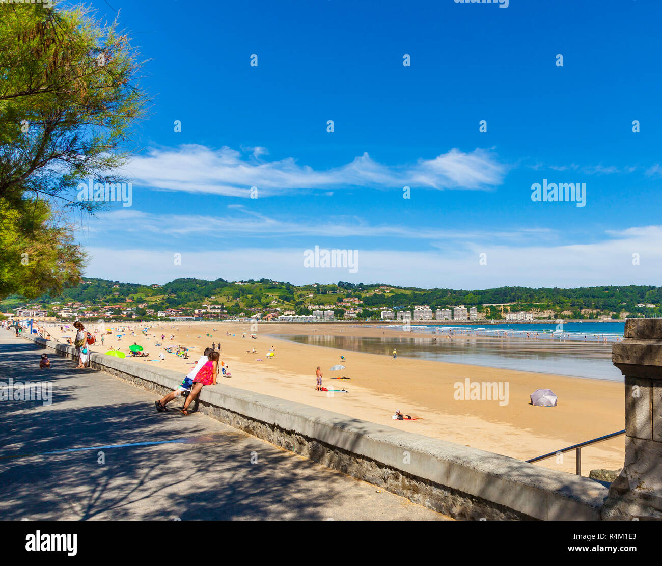 HENDAYE, FRANCE - JUNE 8: Tourists and surfers enjoy the beach of the ...