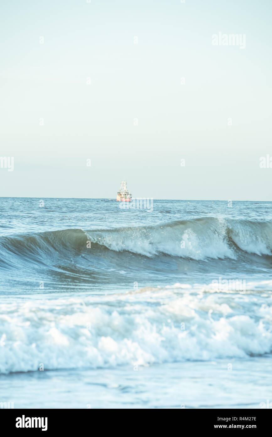 Sea wave breaking Stock Photo - Alamy