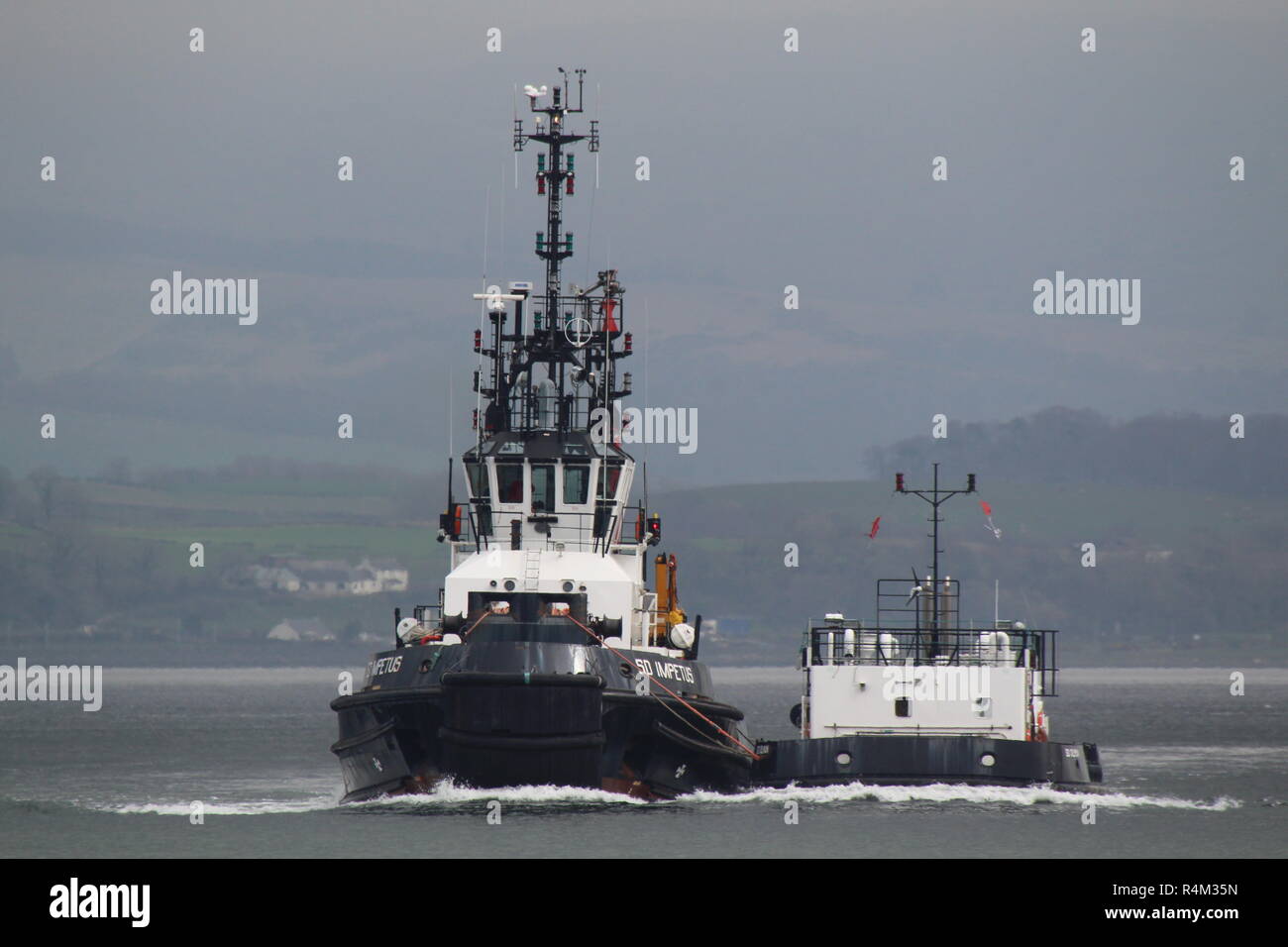 Serco Marine Services' tugboat SD Impetus, with the oiler barge SD ...