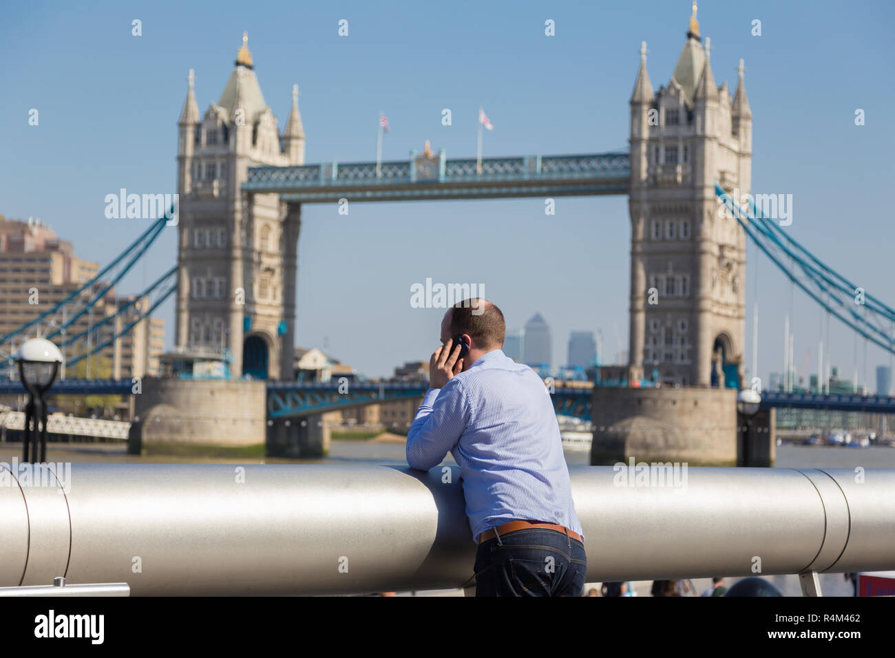 British businessman talking on mobile phone outdoor in London city, UK ...