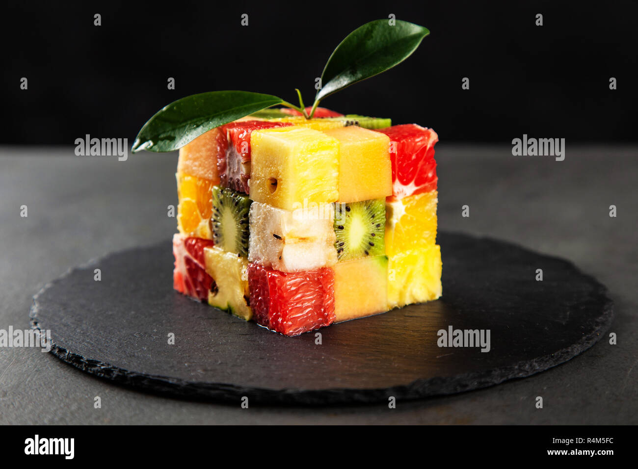 Fruit cube isolated on white background Stock Photo - Alamy