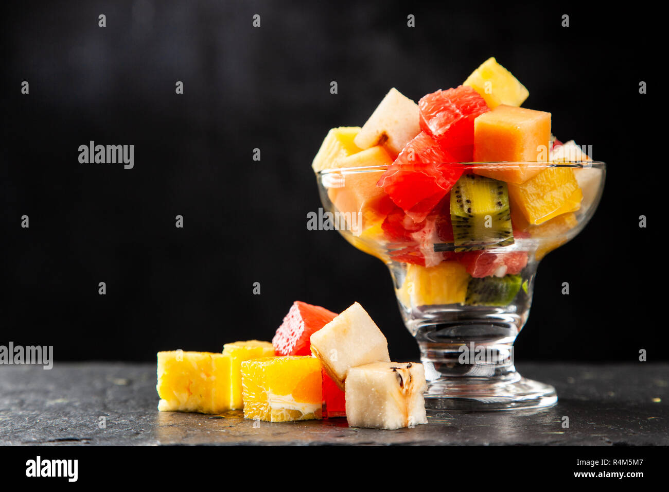 Fruit cube isolated on white background Stock Photo - Alamy