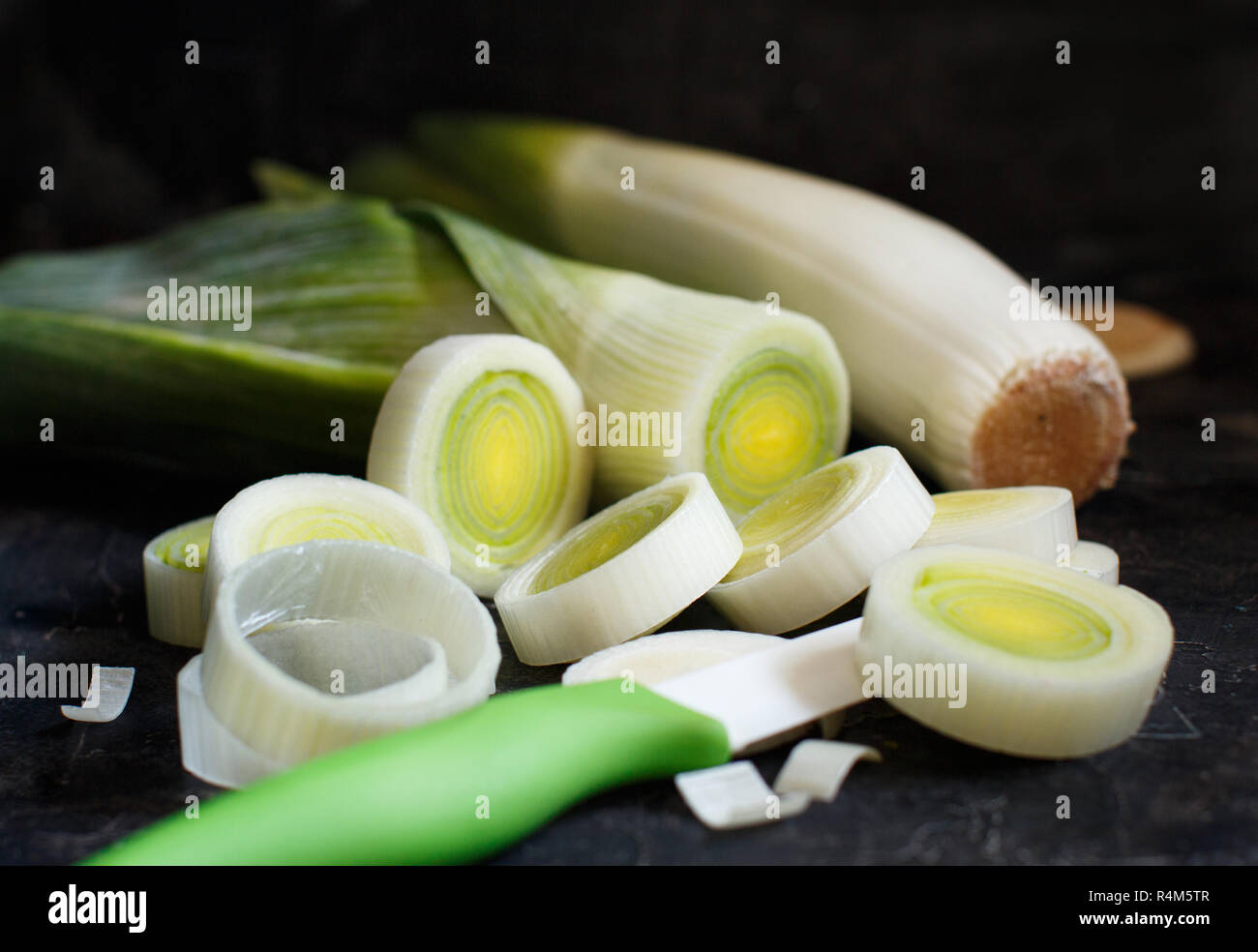 Fresh leeks whole and sliced Stock Photo - Alamy