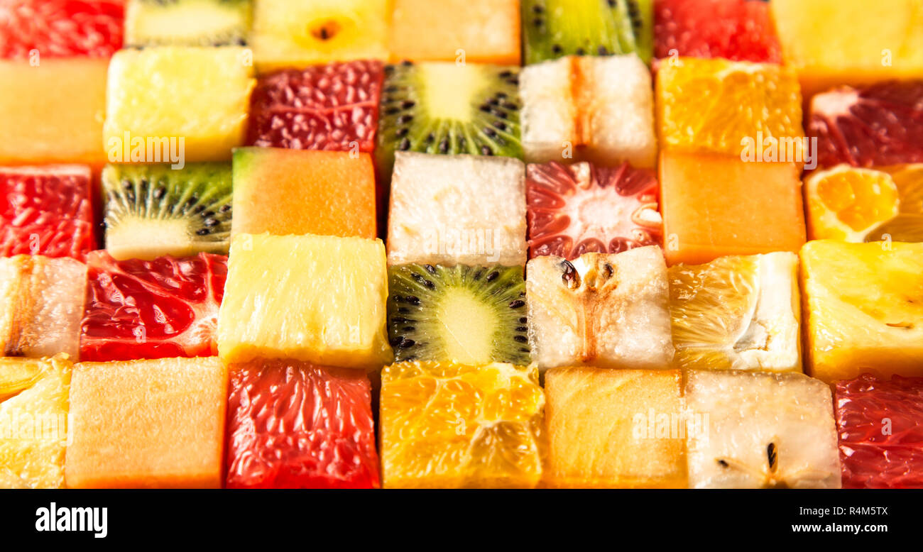 Fruit cube isolated on white background Stock Photo - Alamy