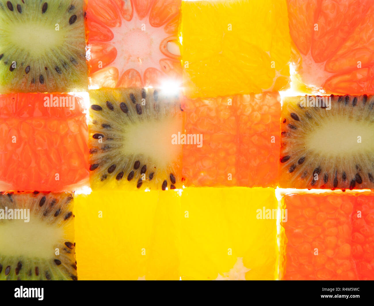 Fruit cube isolated on white background Stock Photo - Alamy