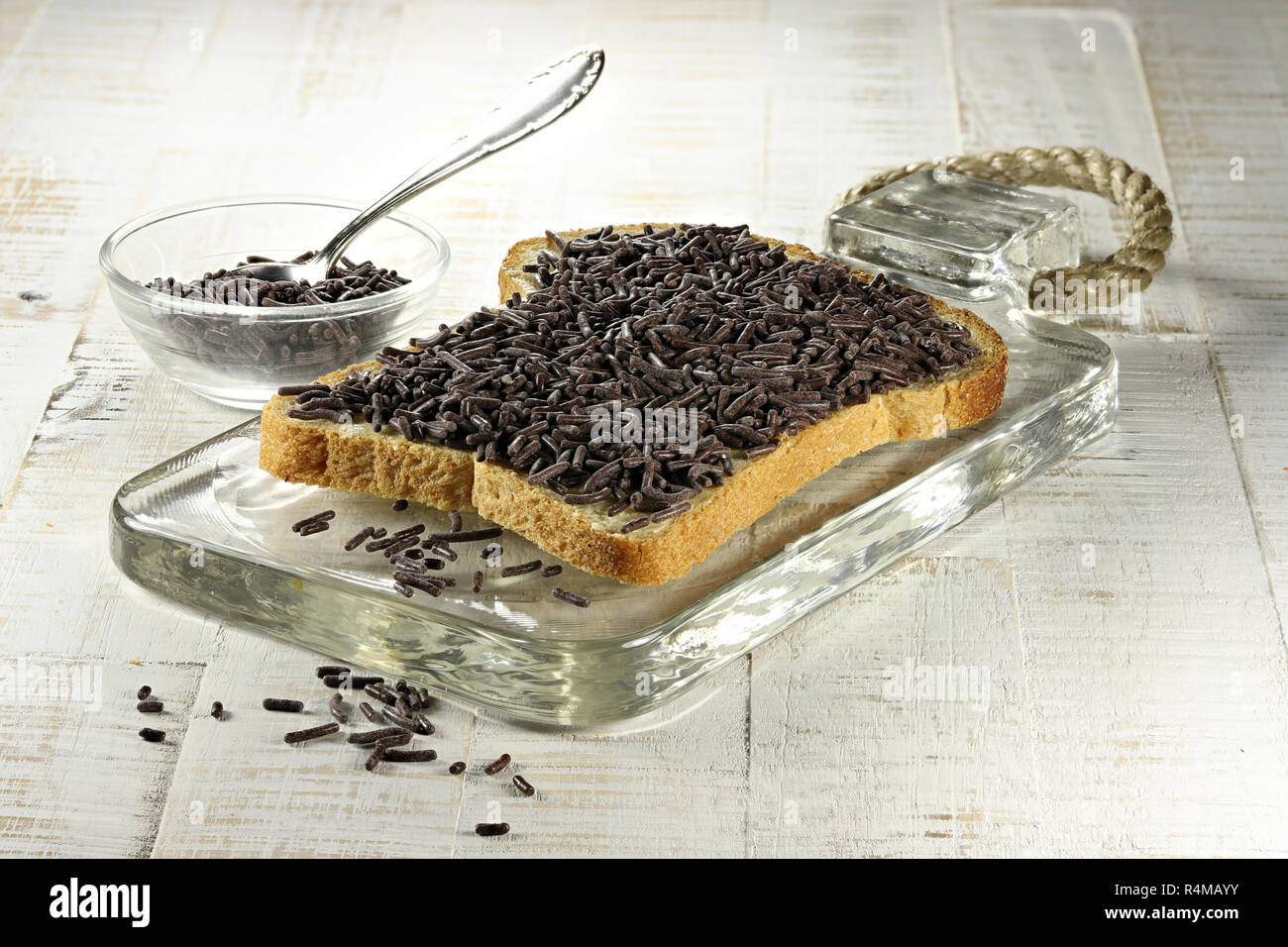 Dutch white bread with hagelslag (chocolate sprinkles) topping on glass ...