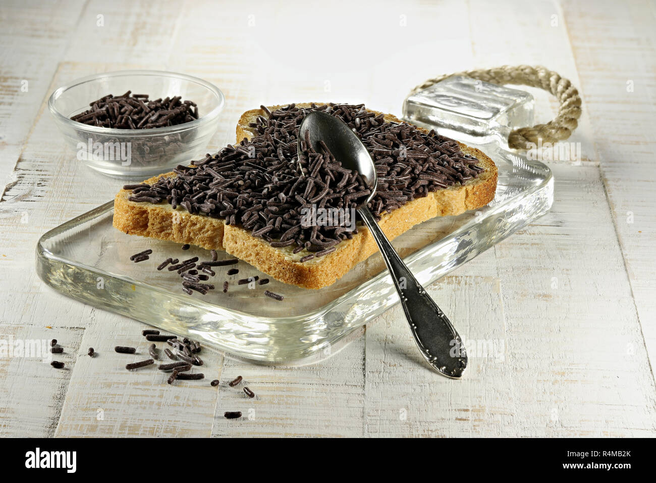 Dutch white bread with hagelslag (chocolate sprinkles) topping on glass ...