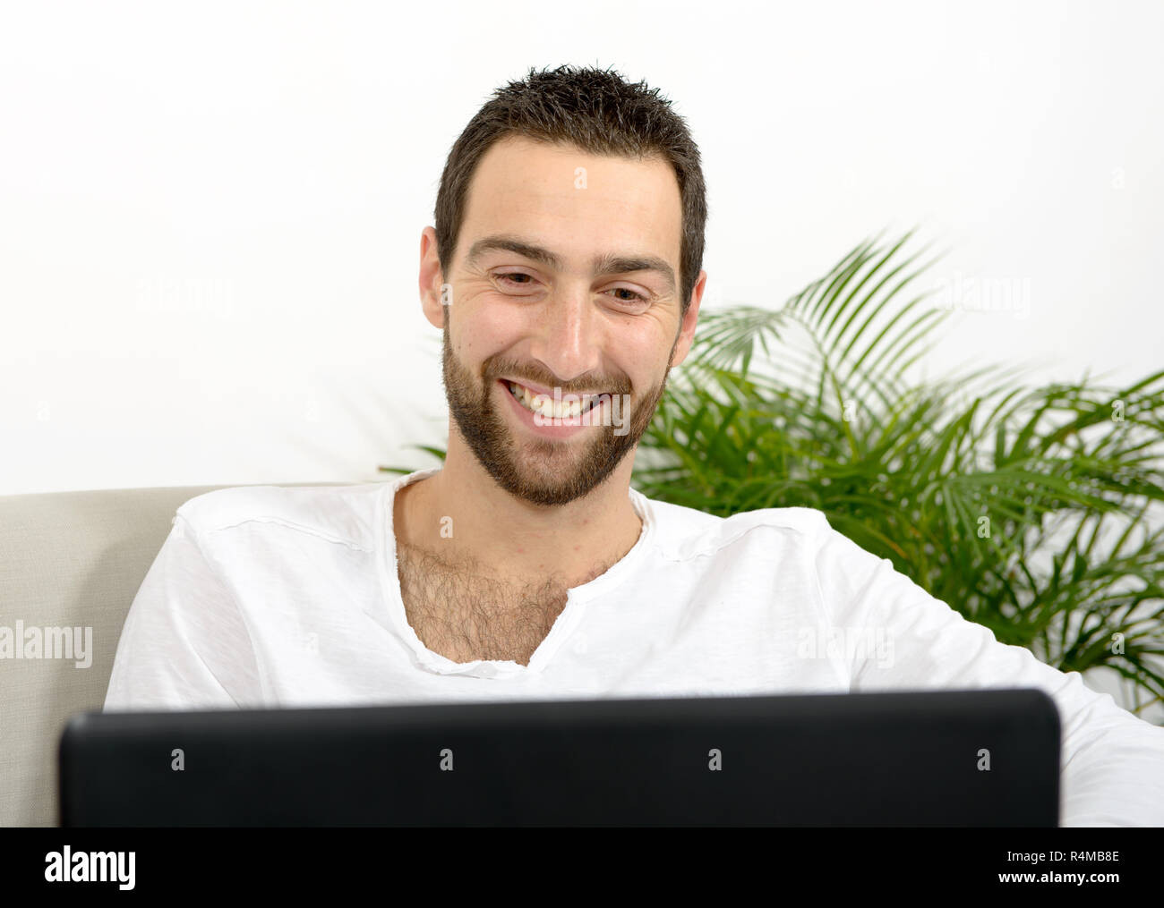 Hispanic man smiles using hi-res stock photography and images - Alamy