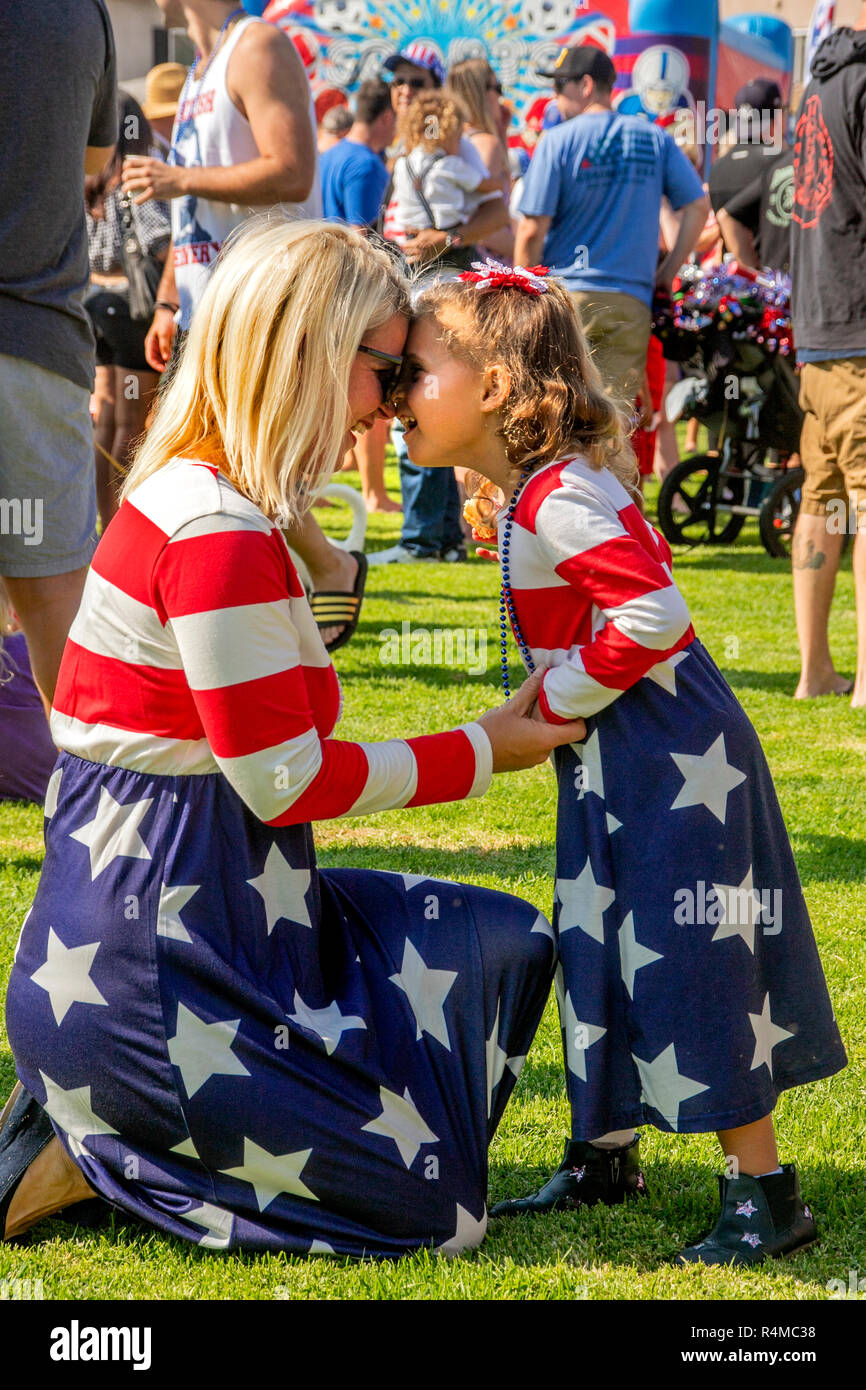 In matching stars and stripes, five-year-old Lauren Grant and mom Kasey ...