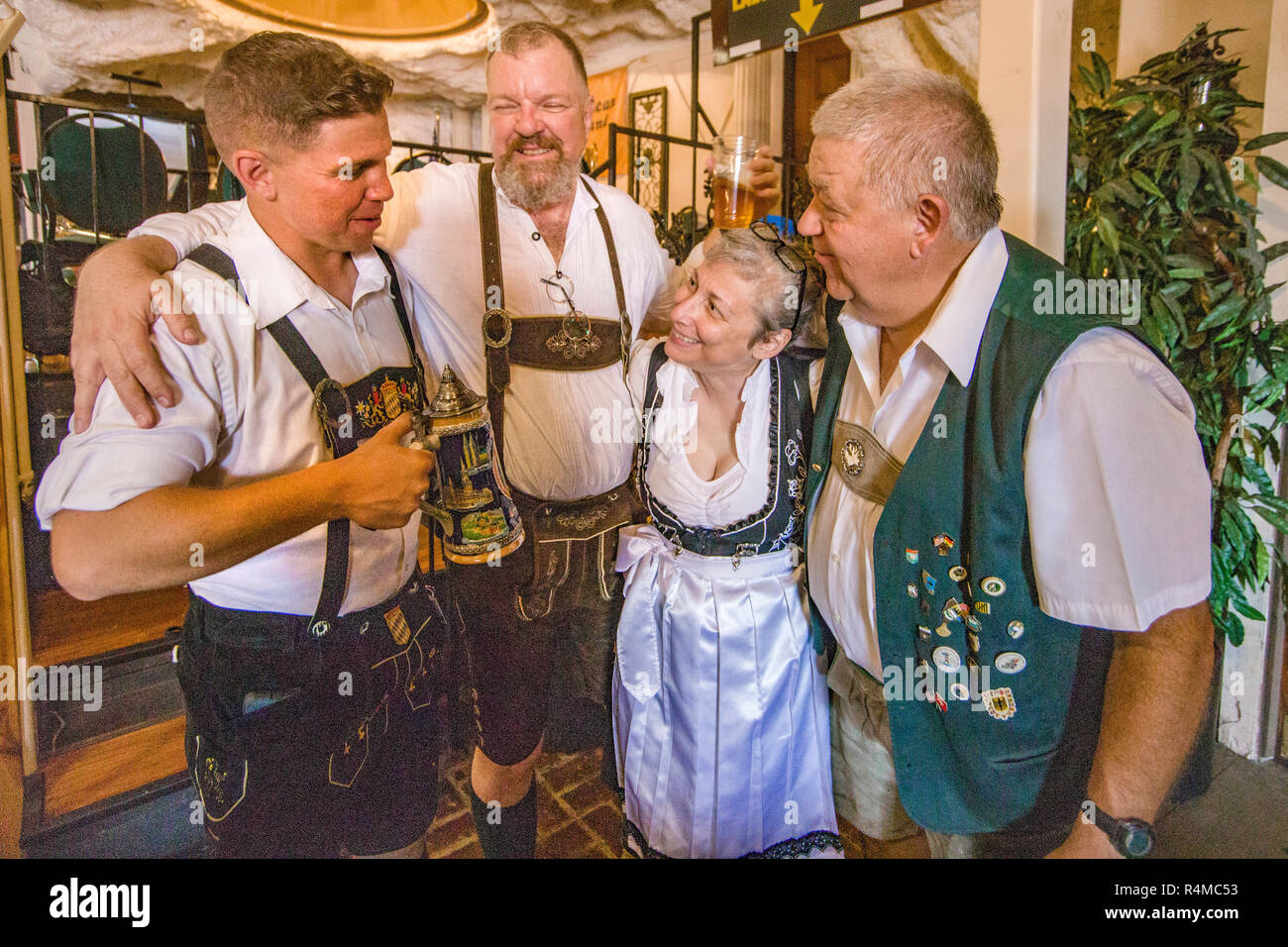 Wearing tradition German costumes, a family poses for a group photo at ...