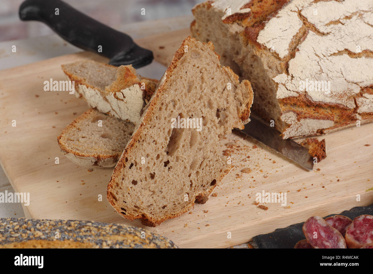 Traditional bread cut into slices Stock Photo - Alamy