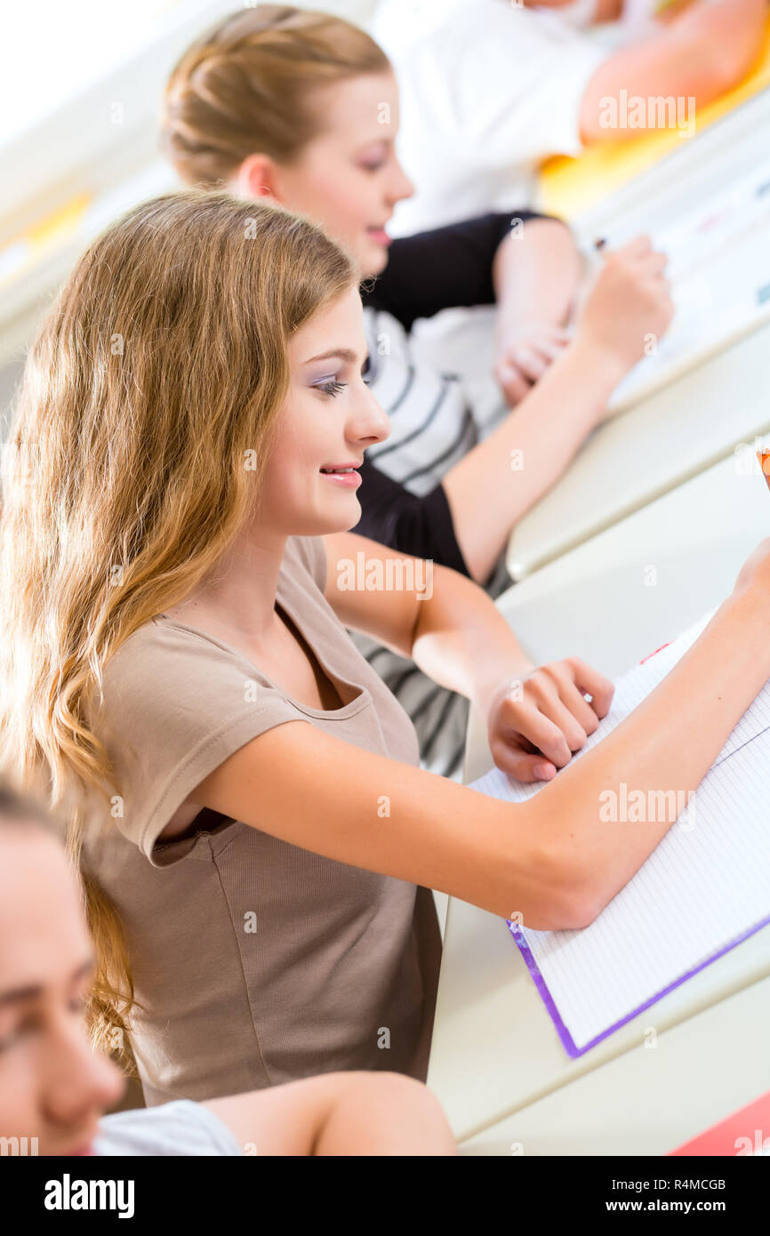Students writing a test in school concentrating Stock Photo - Alamy