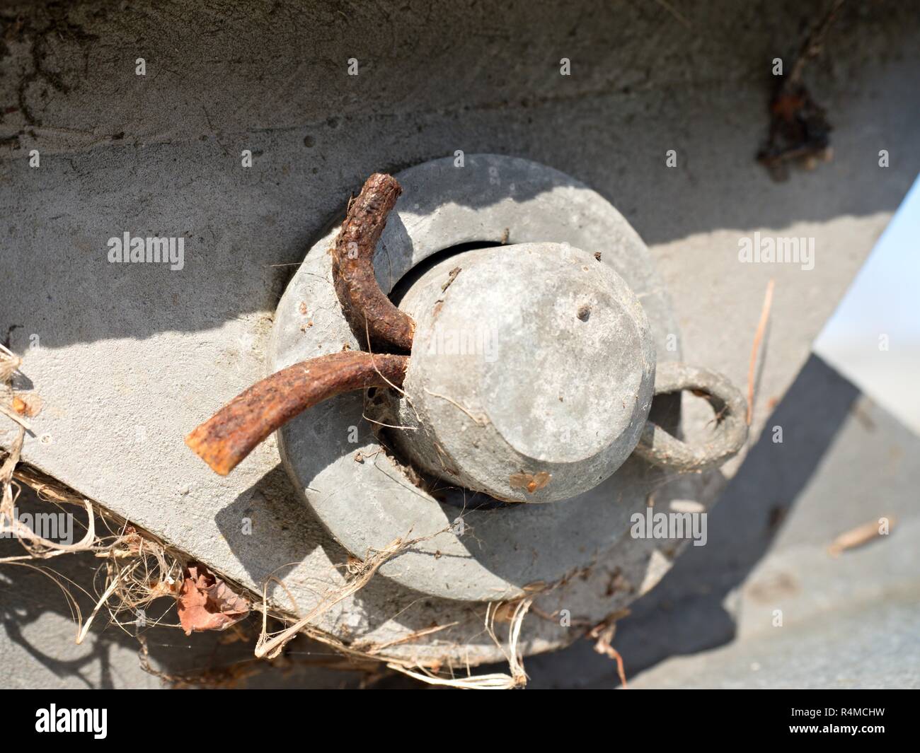 Open split pin as safety part in hole-axe swing joint. Beam joint with ...