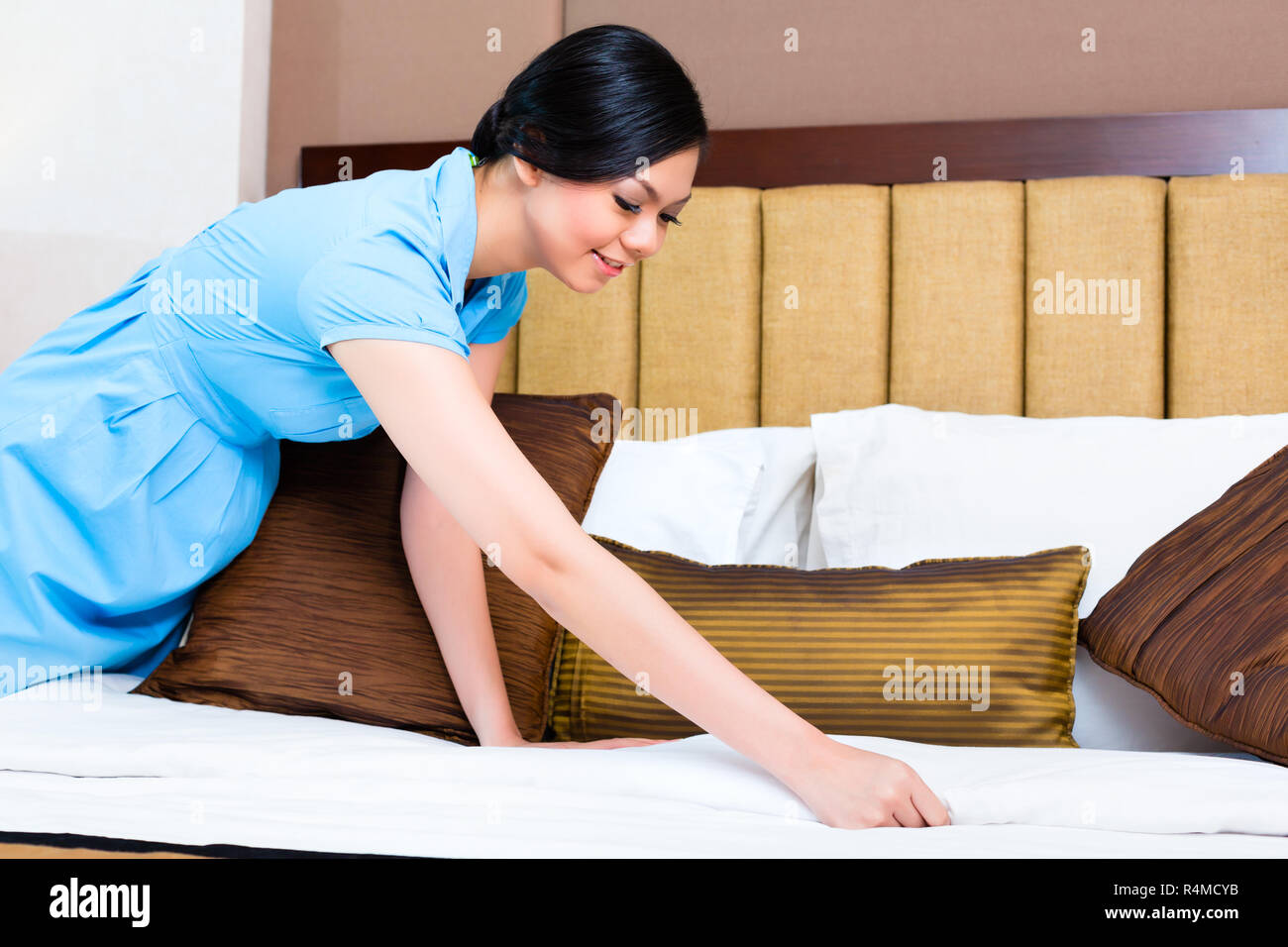 Beautiful hotel maid making hi-res stock photography and images - Alamy