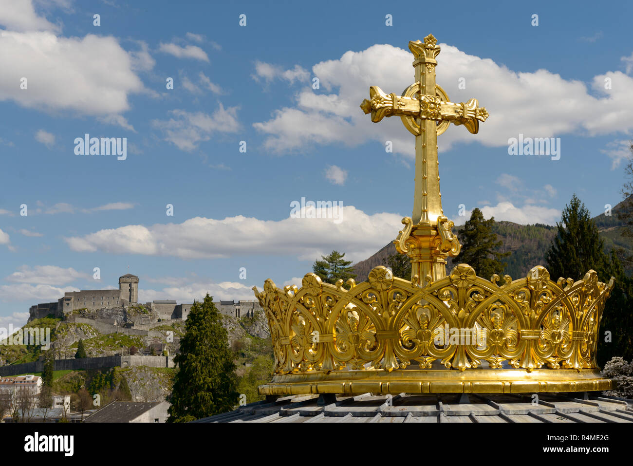 The gilded crown ad cross in Lourdes Stock Photo - Alamy
