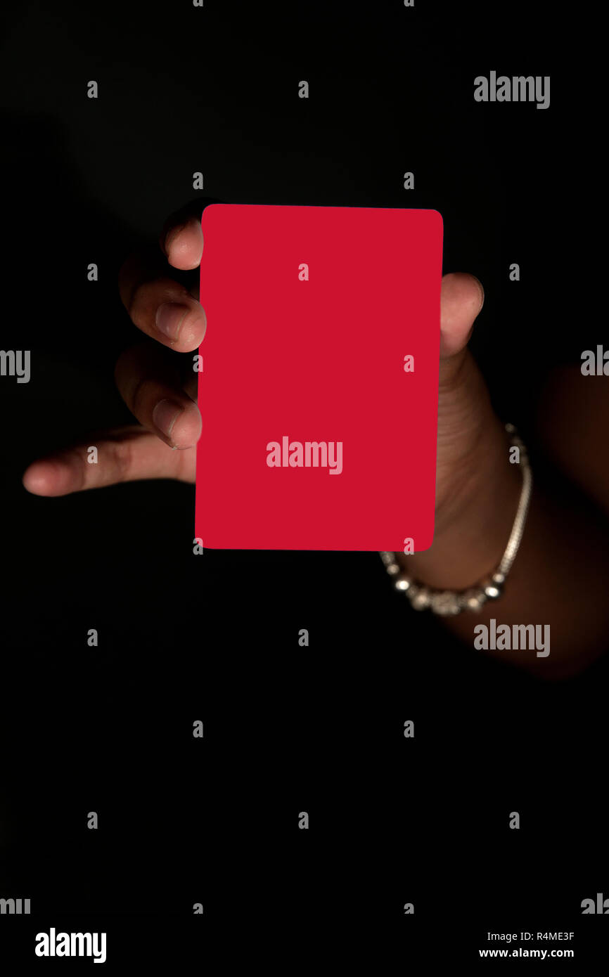 red card hand holding Stock Photo - Alamy